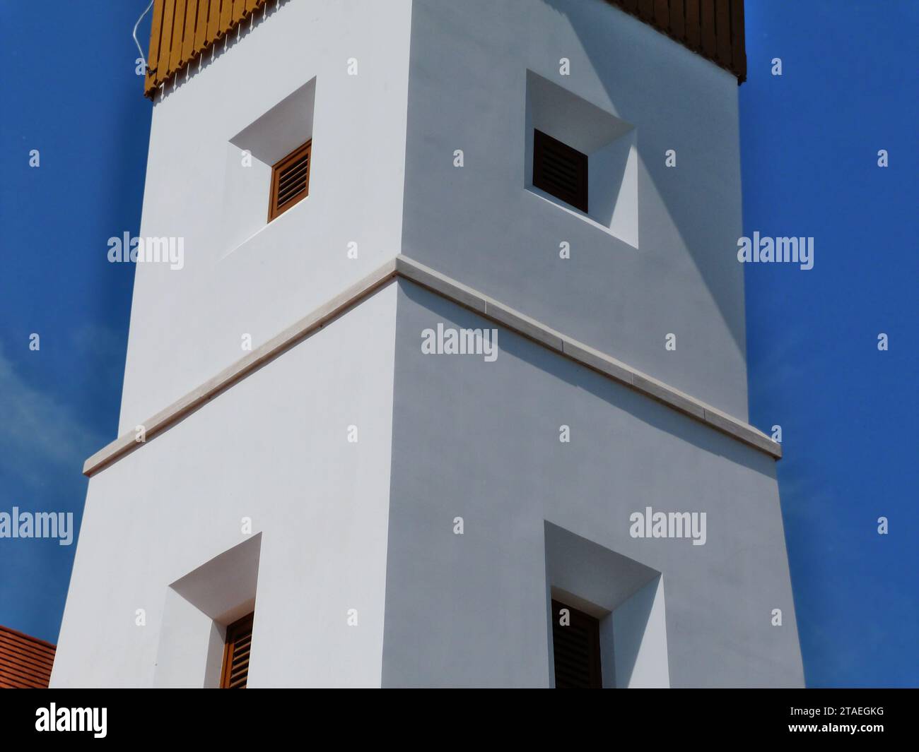modern style white stucco finished church tower detail. small window ...