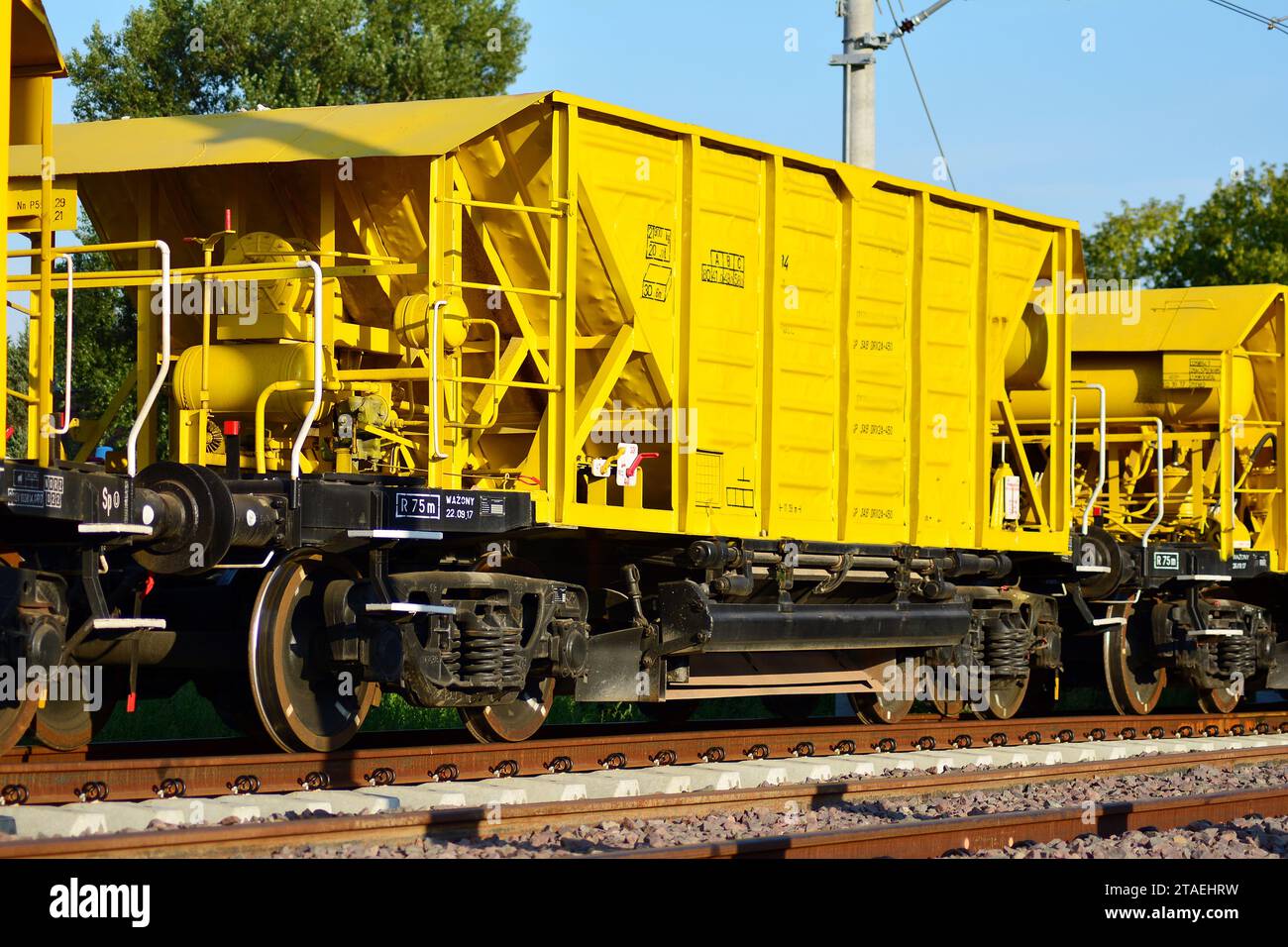 Freight wagons are standing in line at the railway station Stock Photo ...