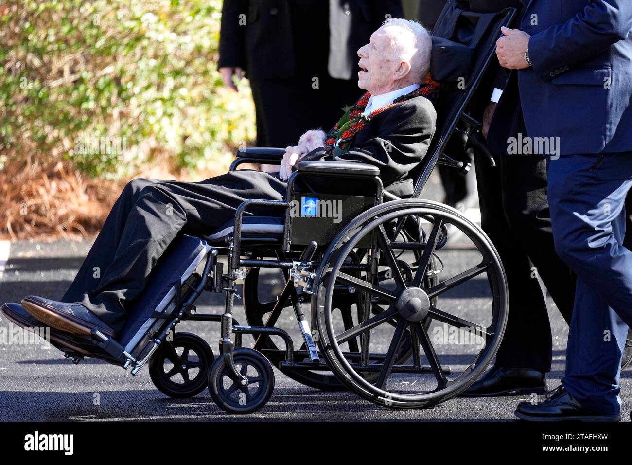 Former President Jimmy Carter departs after attending the funeral service for his wife, former ...