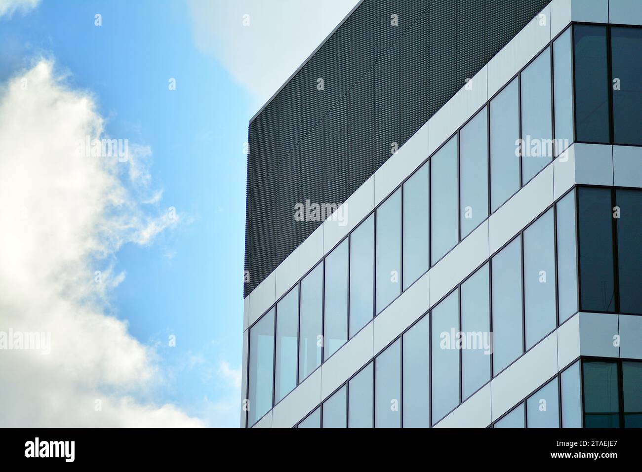 Modern office building in the city with windows and steel and aluminum ...