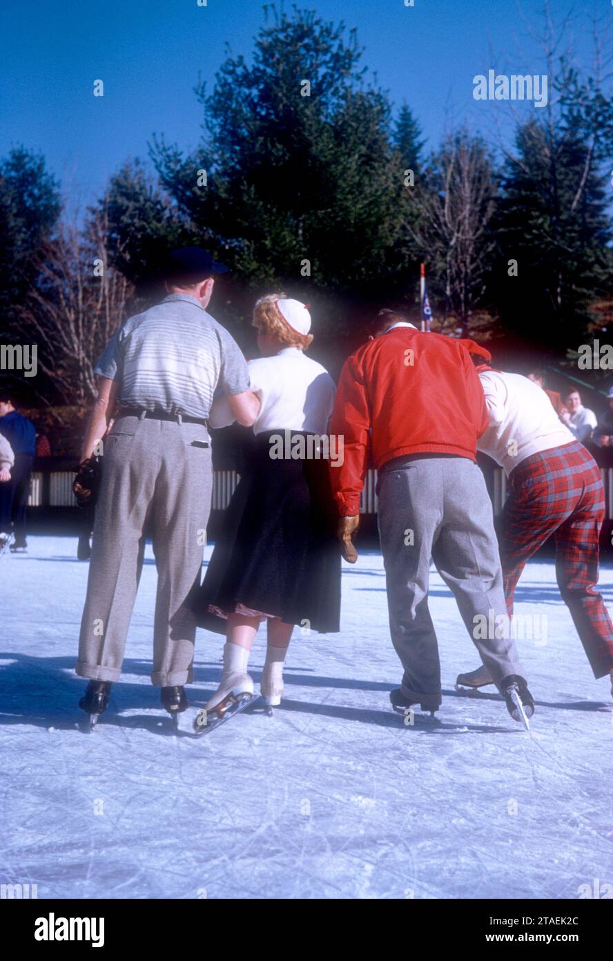 LIBERTY, NY - NOVEMBER 30: Two couples ice skate at Grossinger's Resort ...
