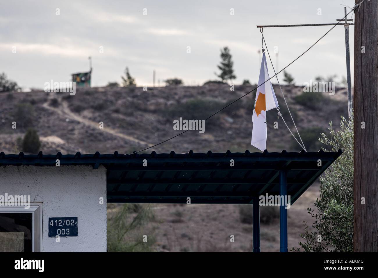 The flag of Cyprus is seen on an unmanned Cypriot army outpost with a ...