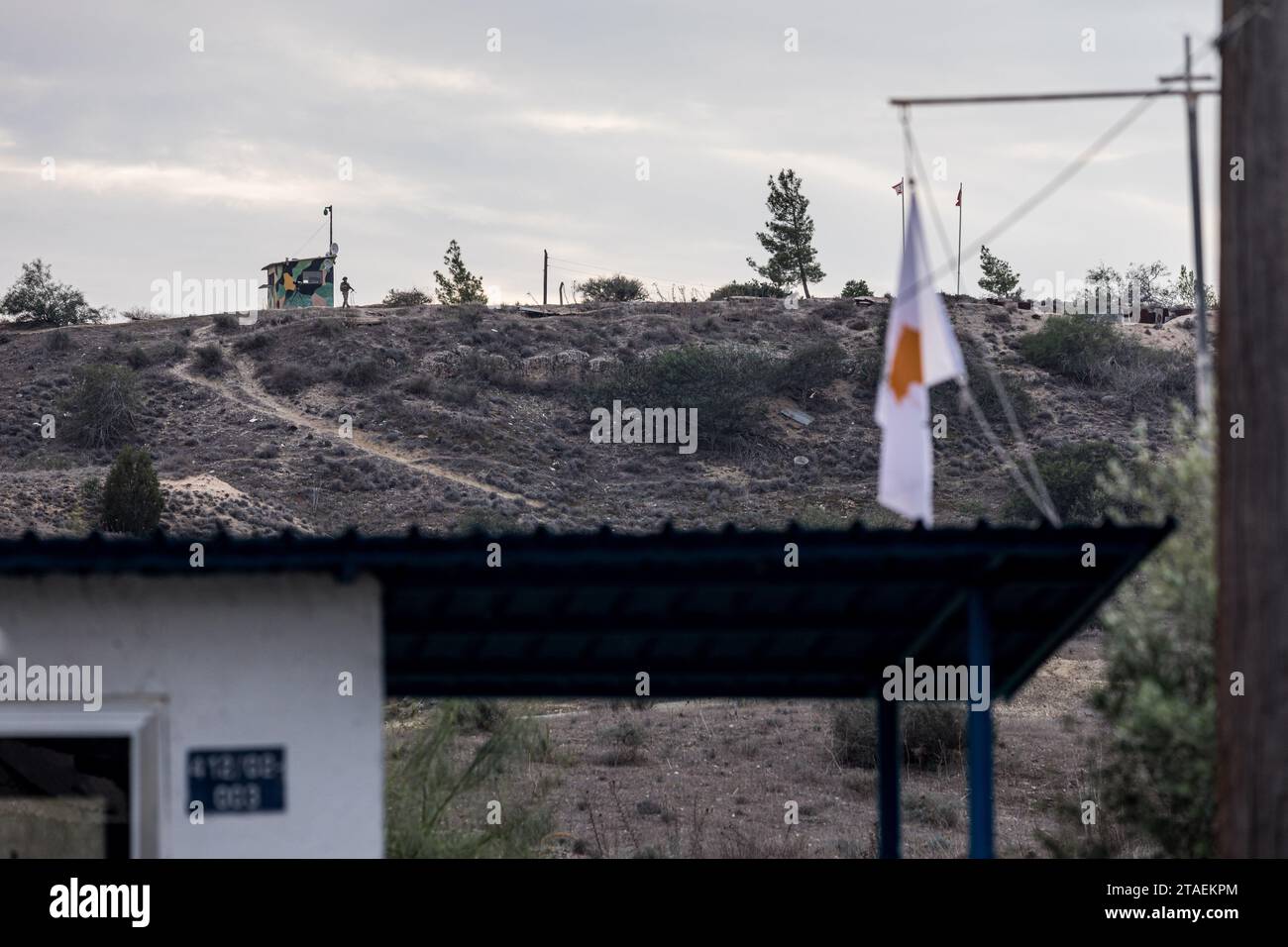 The flag of Cyprus is seen on an unmanned Cypriot army outpost with a ...