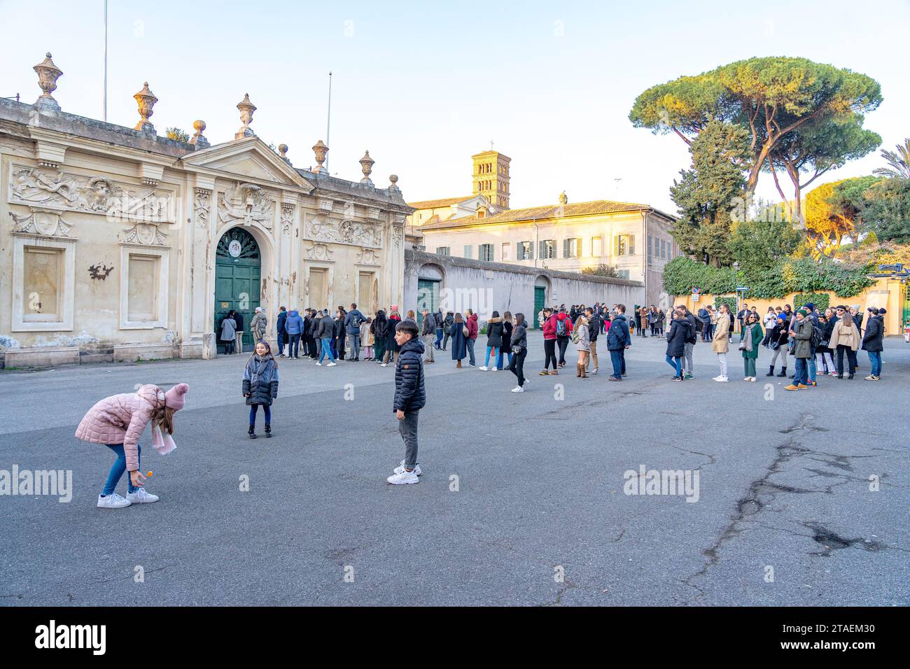 group of people peeking through the keyhole to see the dome of St ...