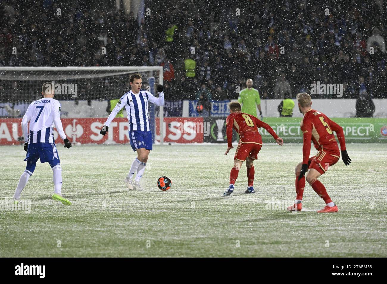 Helsinki, Finland. 30th Nov, 2023. Lucas Lingman (2L) of HJK controls ...