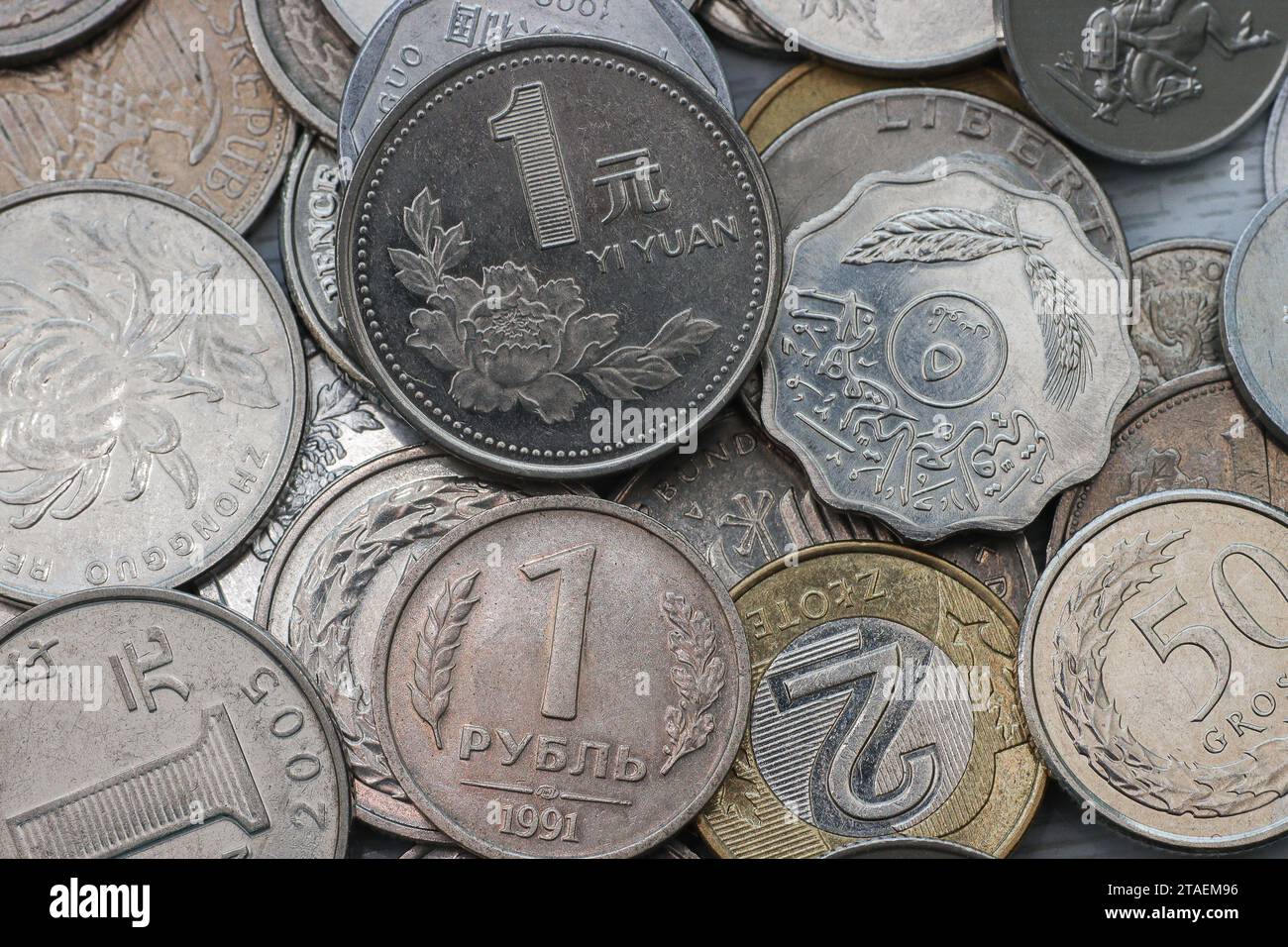 Modern metal coins from different countries, top view, close-up Stock ...