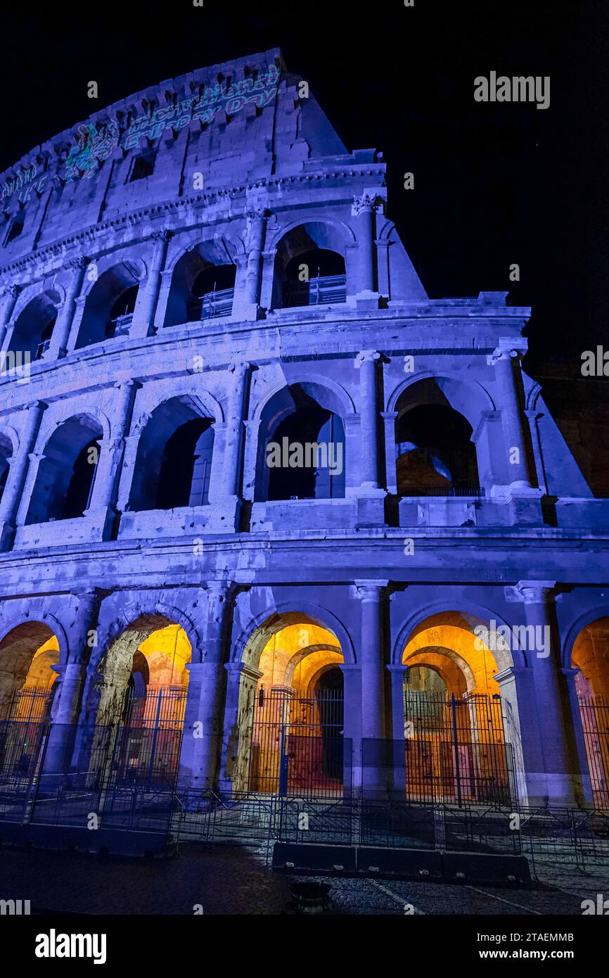 Rome coliseum facade with blue light projection to commemorate ...