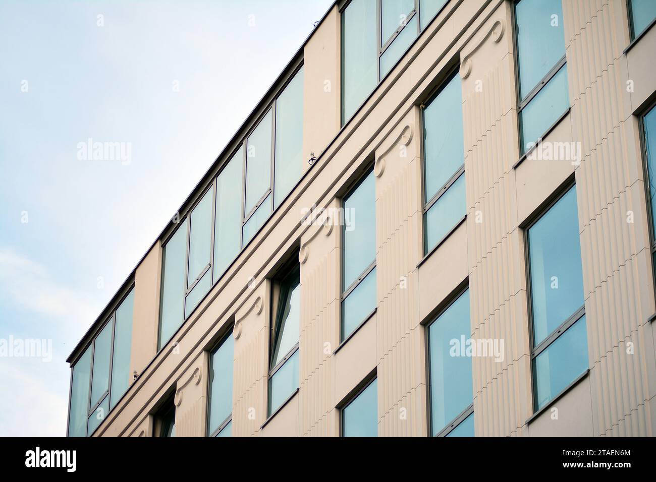 New apartment building with glass balconies. Modern architecture houses ...