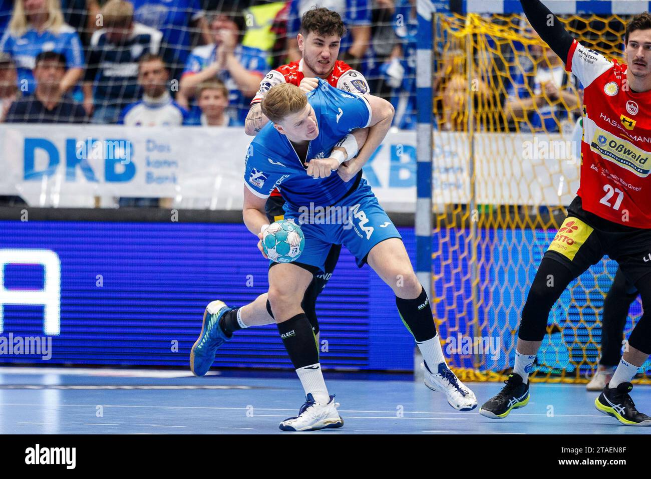 Lemgo, Deutschland. 30th Nov, 2023. v.l. Justin Kurch (ThSV Eisenach, #52), Lukas Hutecek (TBV ...