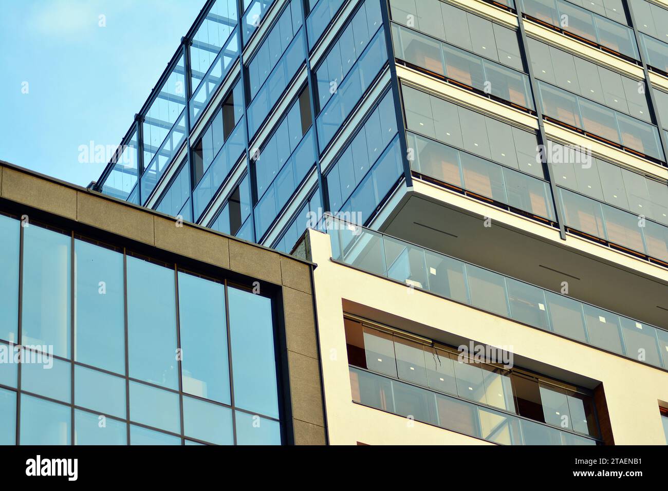 New apartment building with glass balconies. Modern architecture houses ...