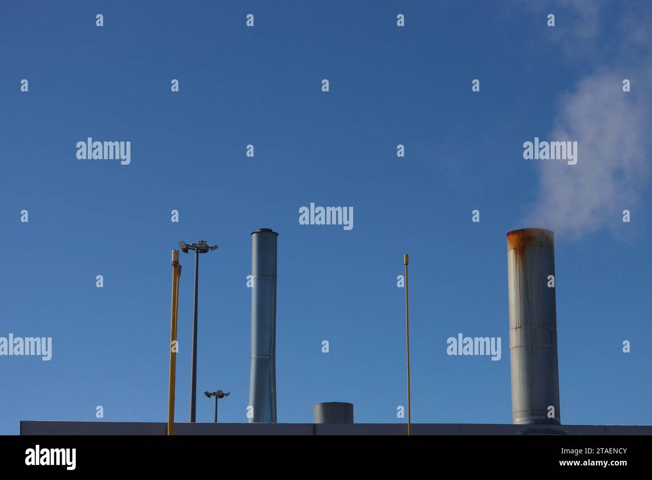 Environmental pollution. Industrial chimneys for exhaust emissions ...