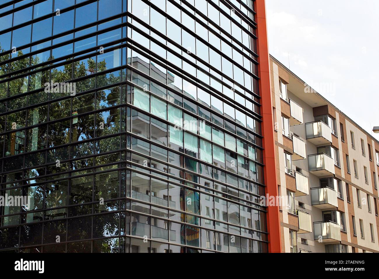 New apartment building with glass balconies. Modern architecture houses ...