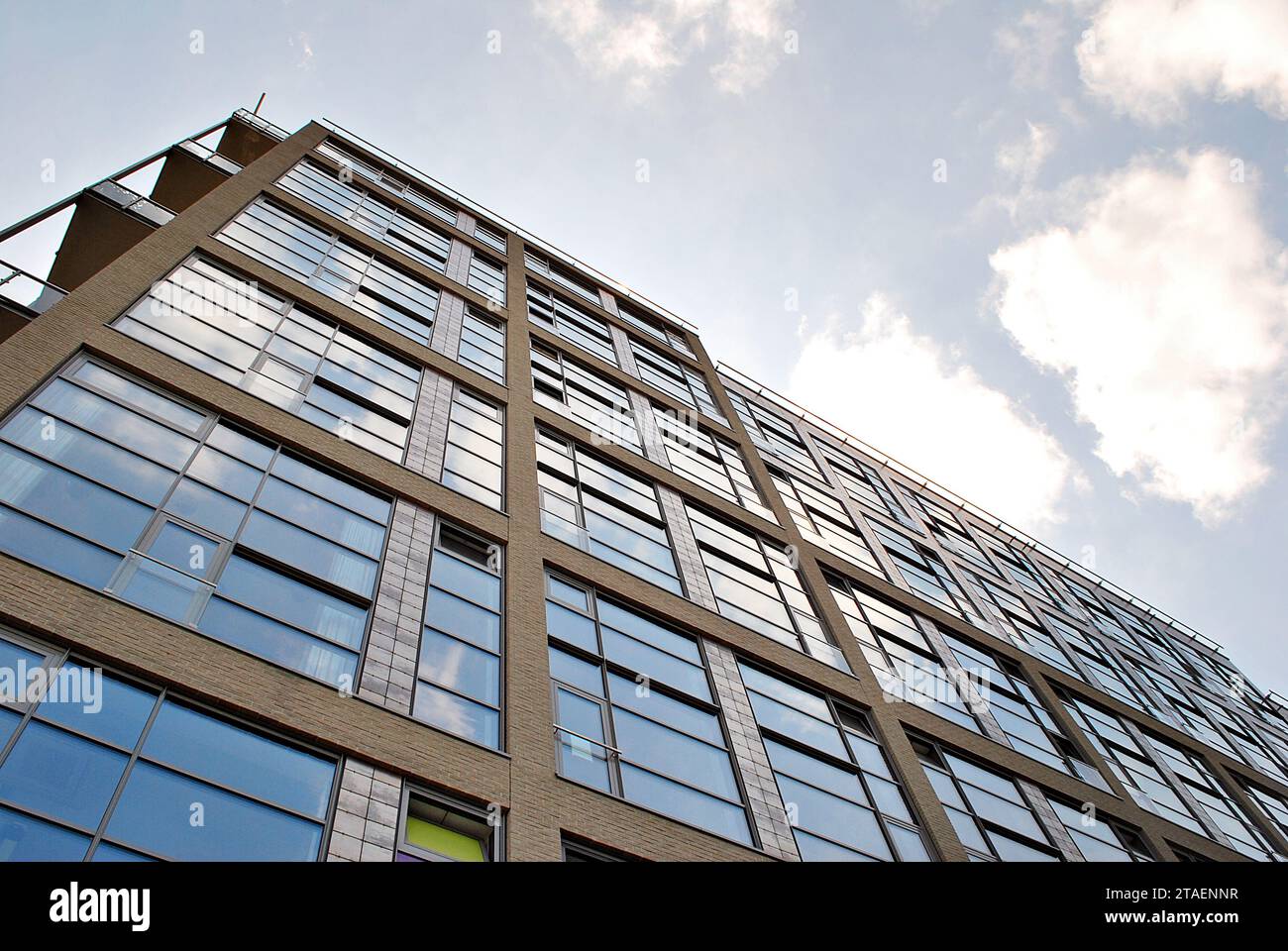 New apartment building with glass balconies. Modern architecture houses ...