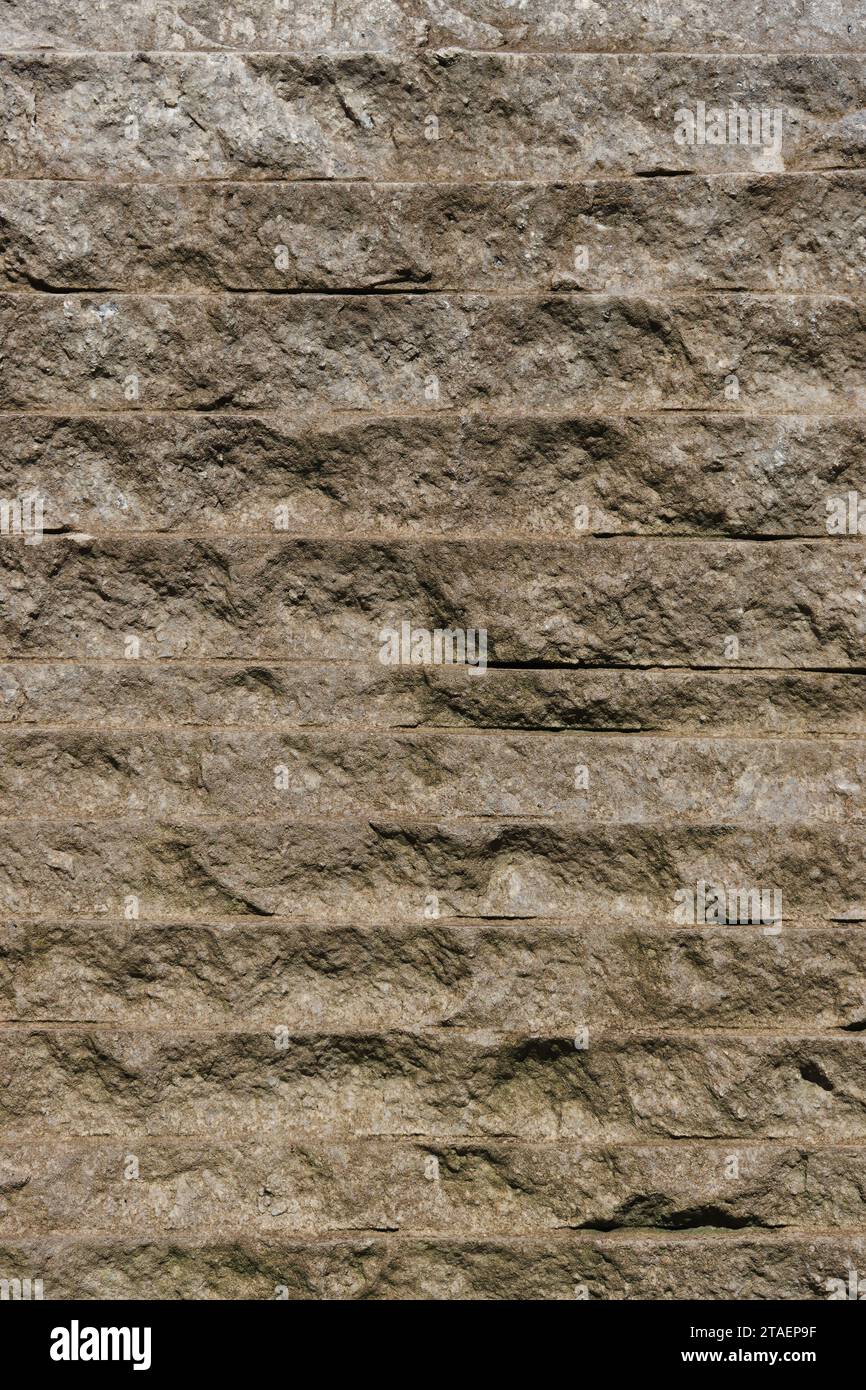 Vertical photo of a stone wall Stock Photo - Alamy
