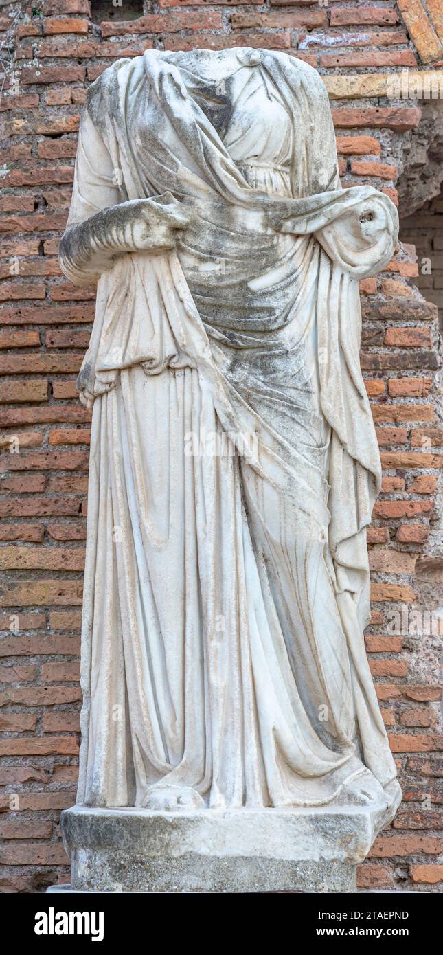 stone statue inside the palatine hill in the space of the sacerdotal ...