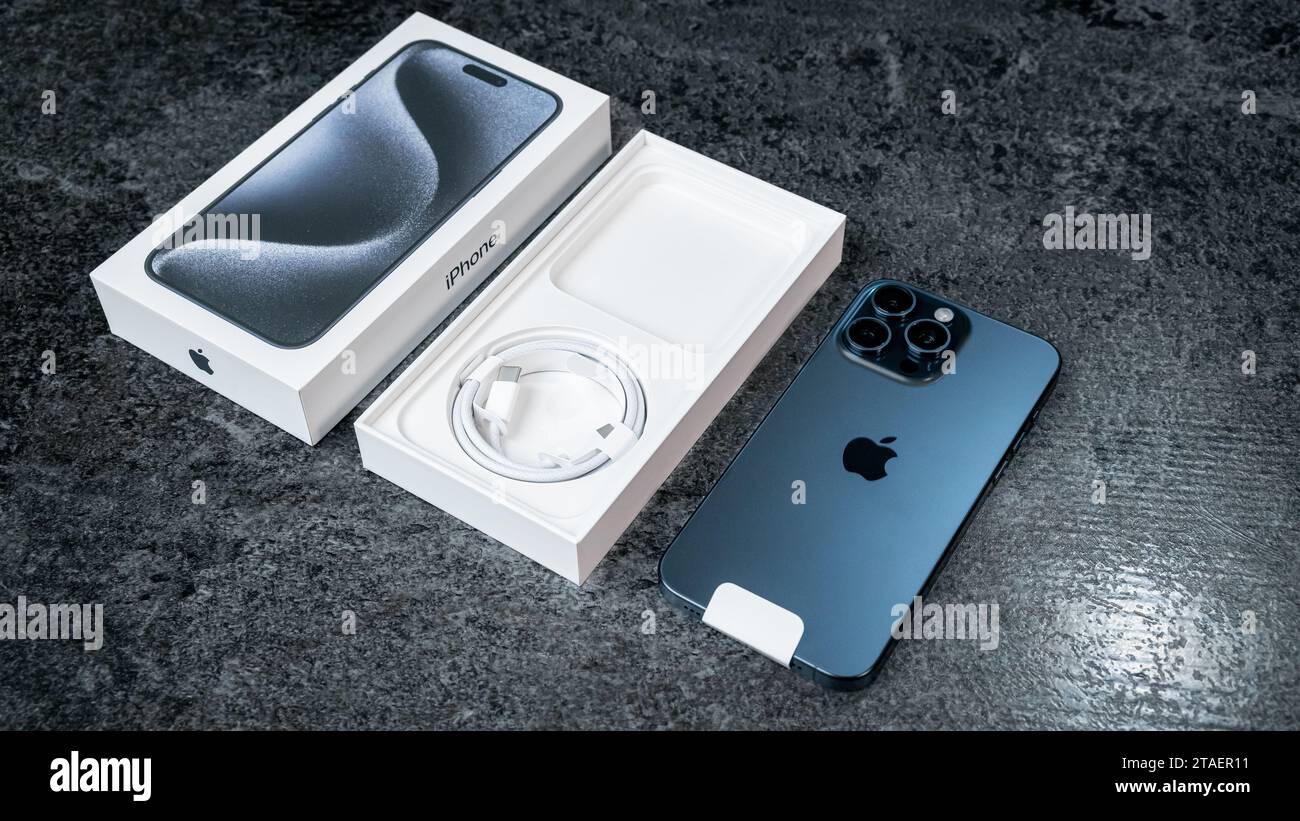 Jurmala, Latvia - 30 11 2023: unboxing of new smarphone apple iPhone 15 ...