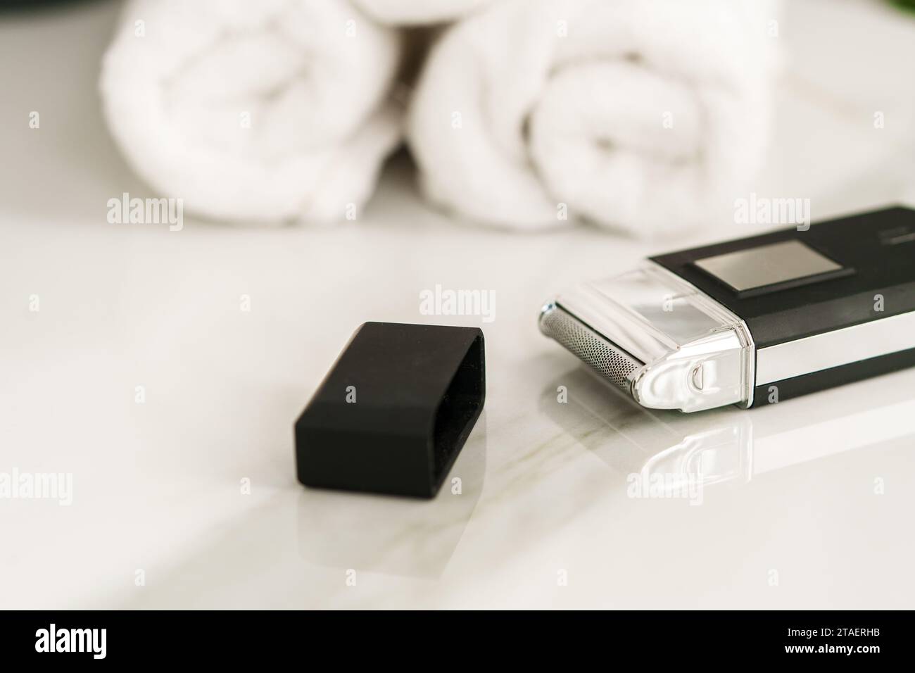 Electric shaver for men in a bathroom close up Stock Photo - Alamy