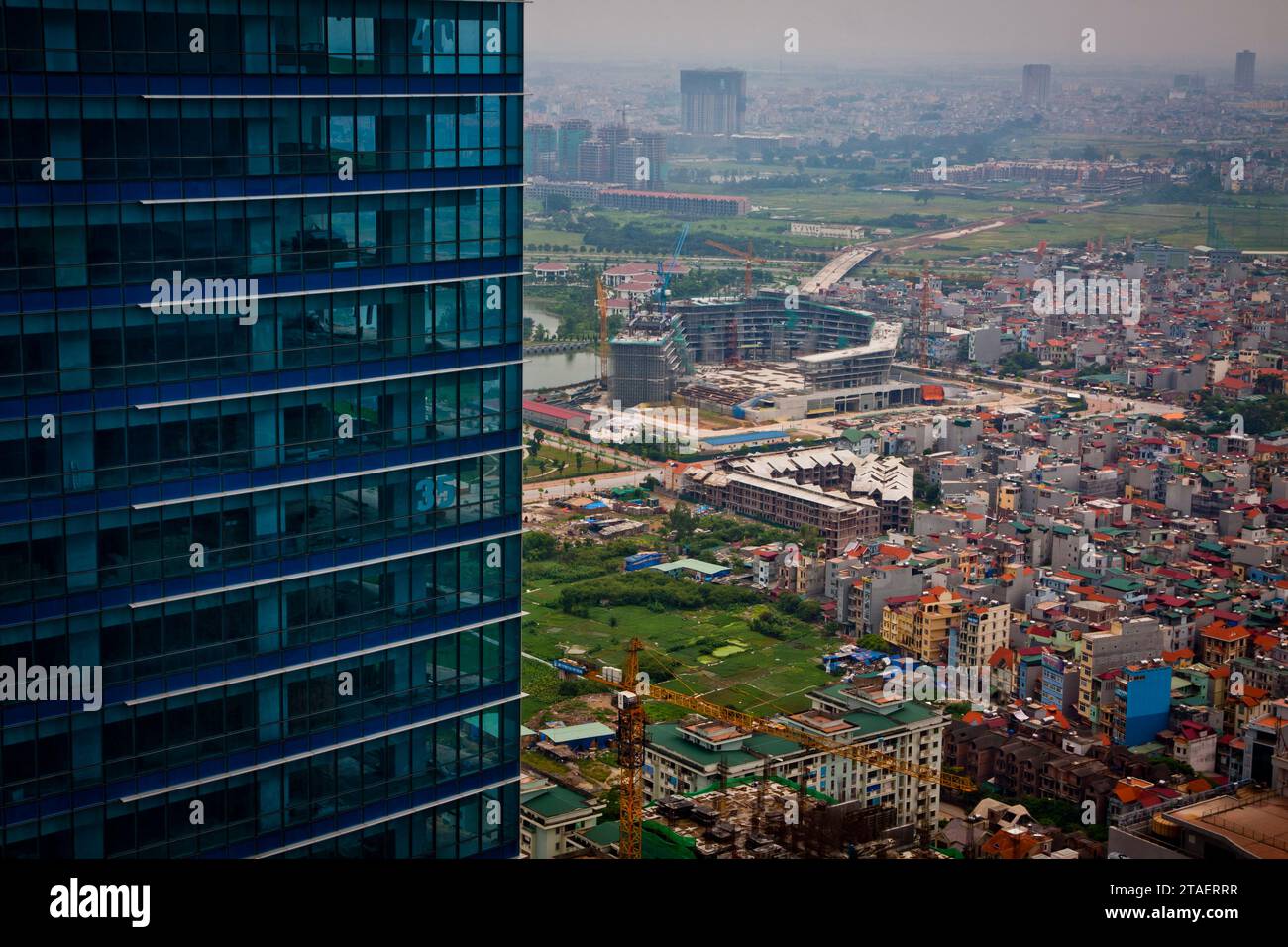 A new, modern high-rise, Landmark Tower, under construction in My Dinh ...