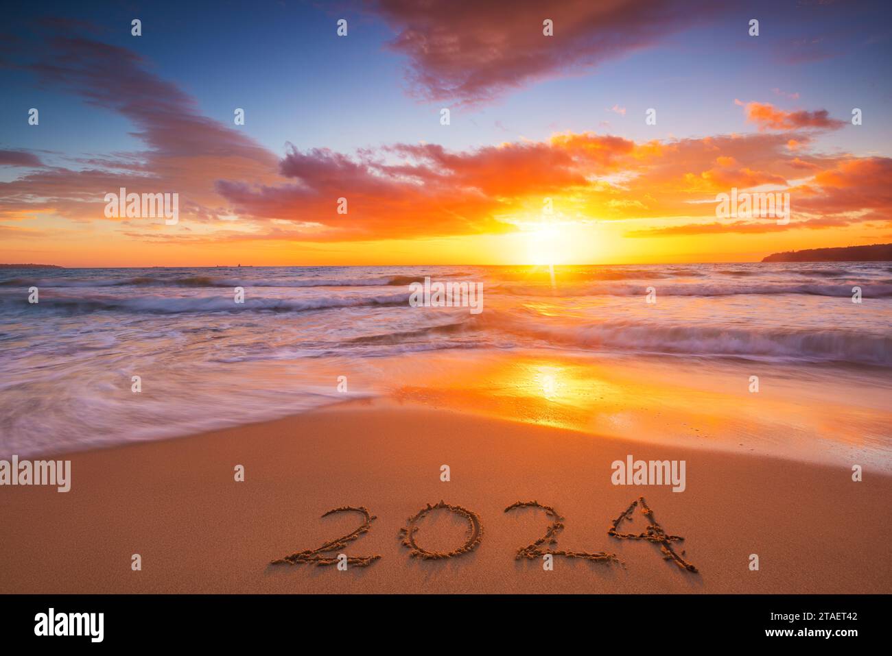 Happy New Year 2024 concept, lettering on the beach. Written text on ...