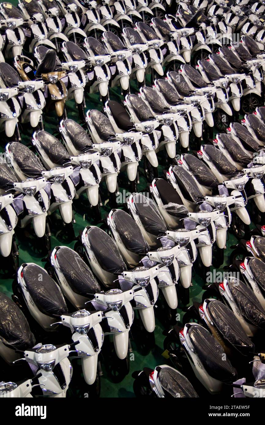 Completed Vespas at the end of the assembly line at the Piaggio Factory ...