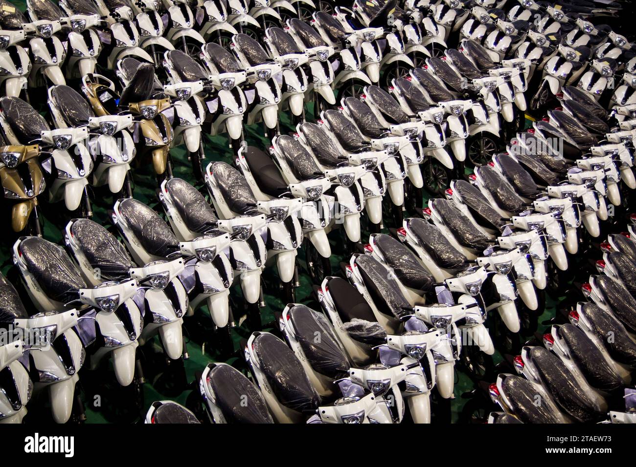 Completed Vespas at the end of the assembly line at the Piaggio Factory ...