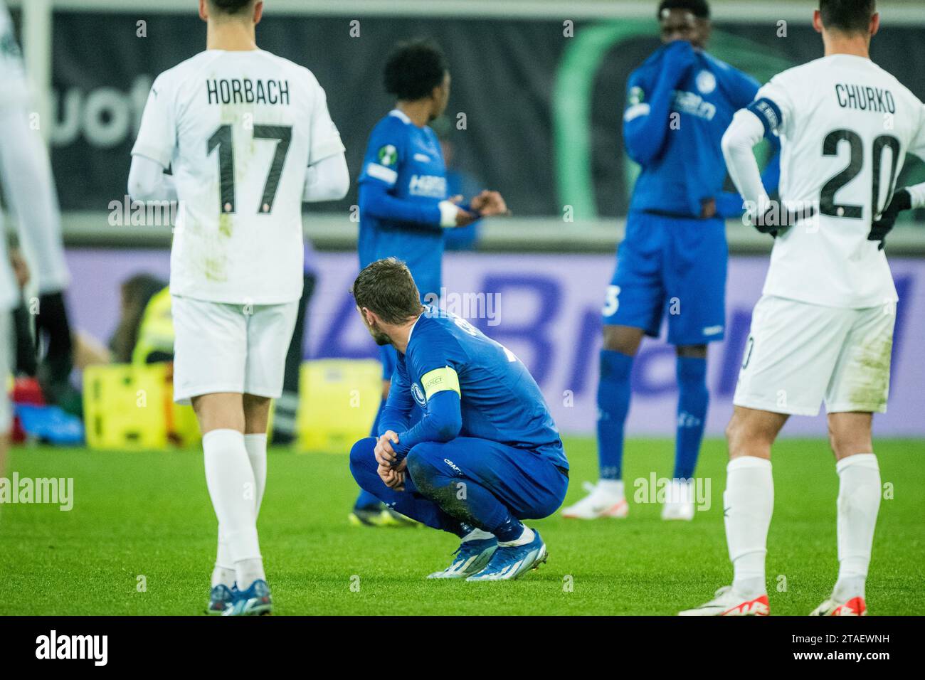 Gent, Belgium. 30th Nov, 2023. Gent's goalkeeper Paul Nardi and Gent's Hugo Cuypers looks ...