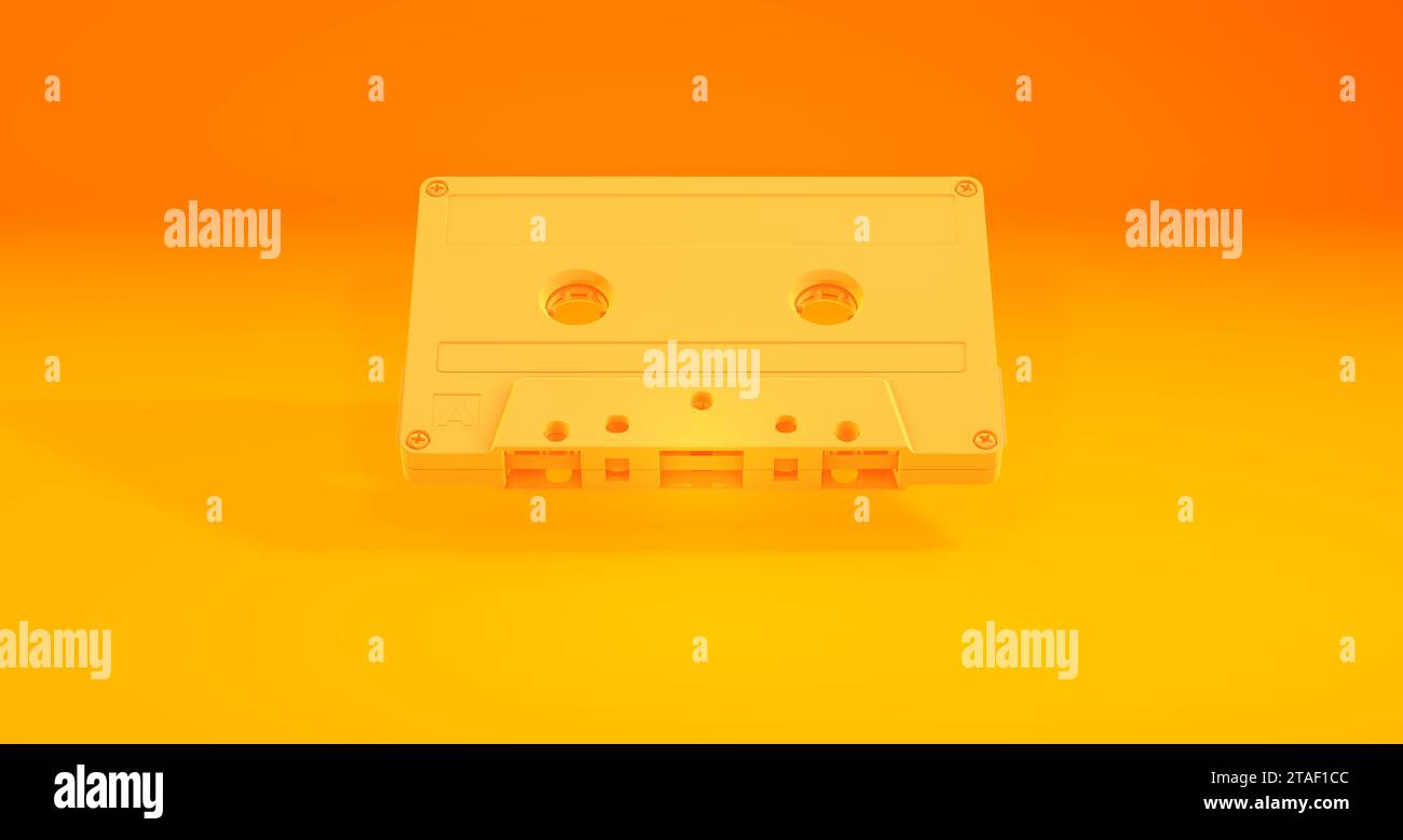 Yellow Cassette Tape on Orange Studio Background. Perspective view ...