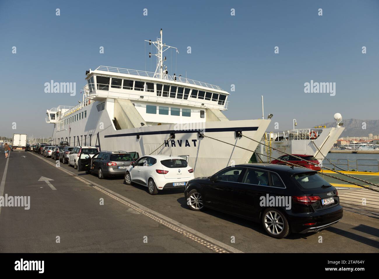 Split, Croatia - August 19, 2017: Cars waiting for ferry boarding in ... Split, Croatia - August 19, 2017: Cars waiting for ferry boarding in ...