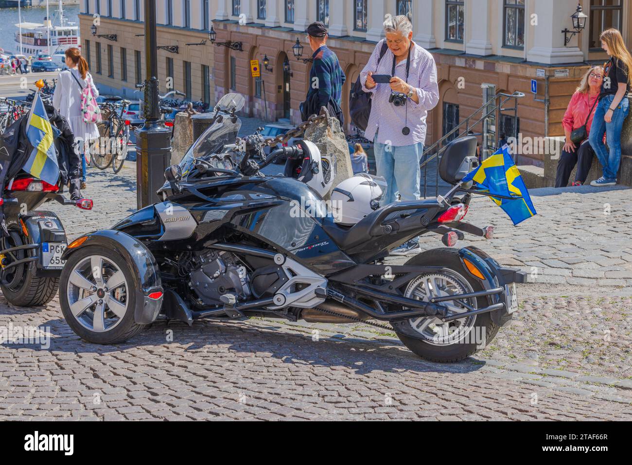 View of elderly tourist capturing moment with his camera, photographing ...