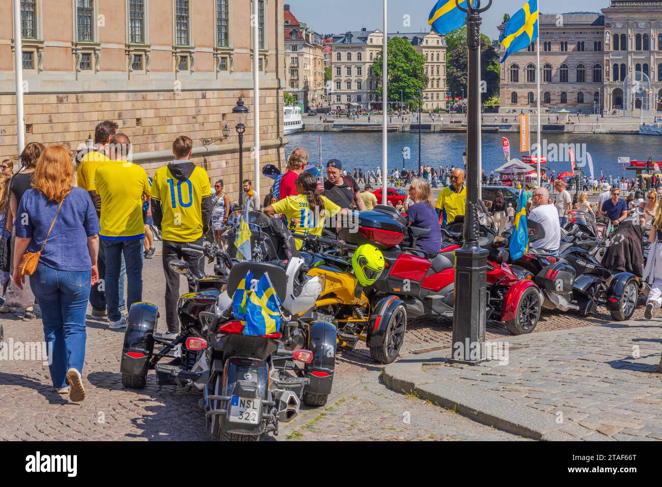 View of group of bikers on three-wheeled motorized vehicles gathering ...