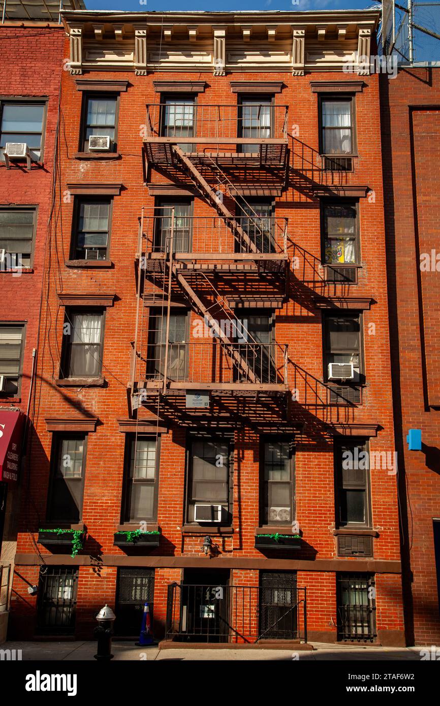 Fire escape ladders on apartment builds Stock Photo - Alamy