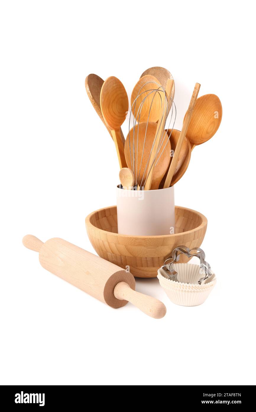 Wooden baking utensils and cookie cutters isolated on white background ...