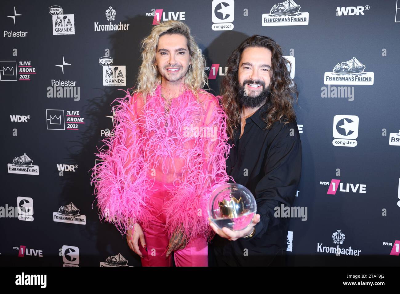 Bielefeld, Germany. 30th Nov, 2023. Tom (r) and Bill Kaulitz from the ...