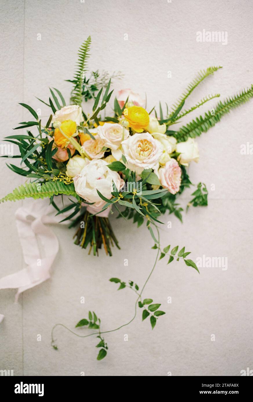 Bridal bouquet lies on a white tile. Top view Stock Photo - Alamy