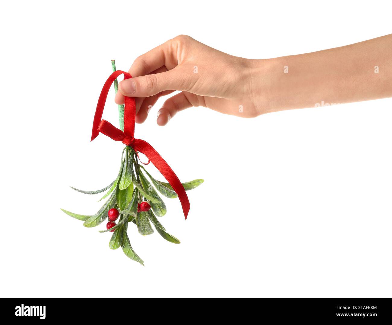 Female hand with mistletoe branch on white background Stock Photo - Alamy