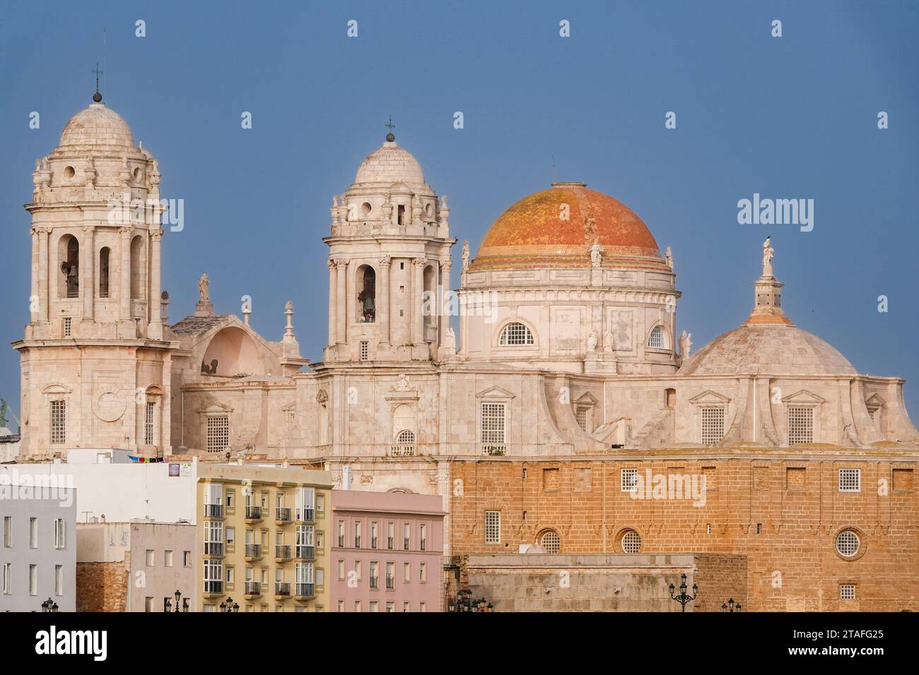 The domes of the Cadiz Cathedral and the Baroque Santiago church rising ...