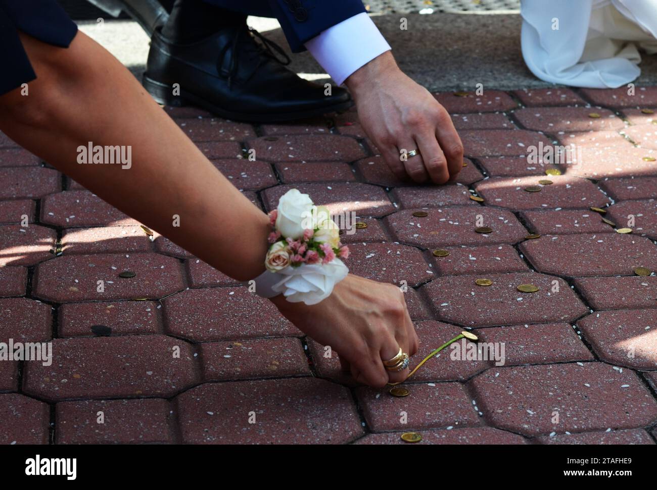 Polish wedding tradition, picking coins from the ground Stock Photo - Alamy