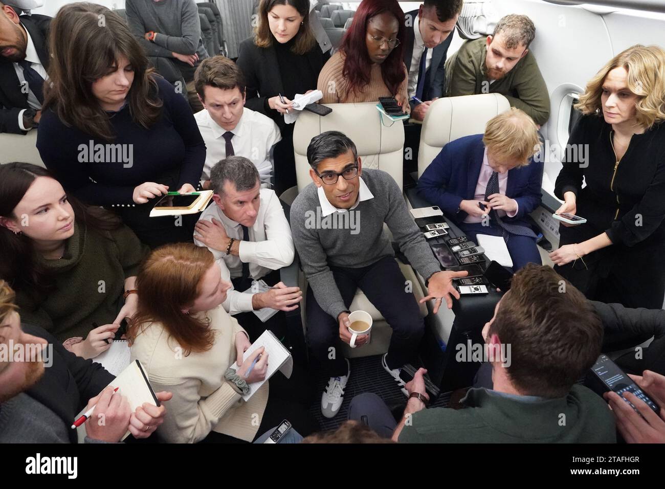 Prime Minister Rishi Sunak holds a "huddle" press conference with ...