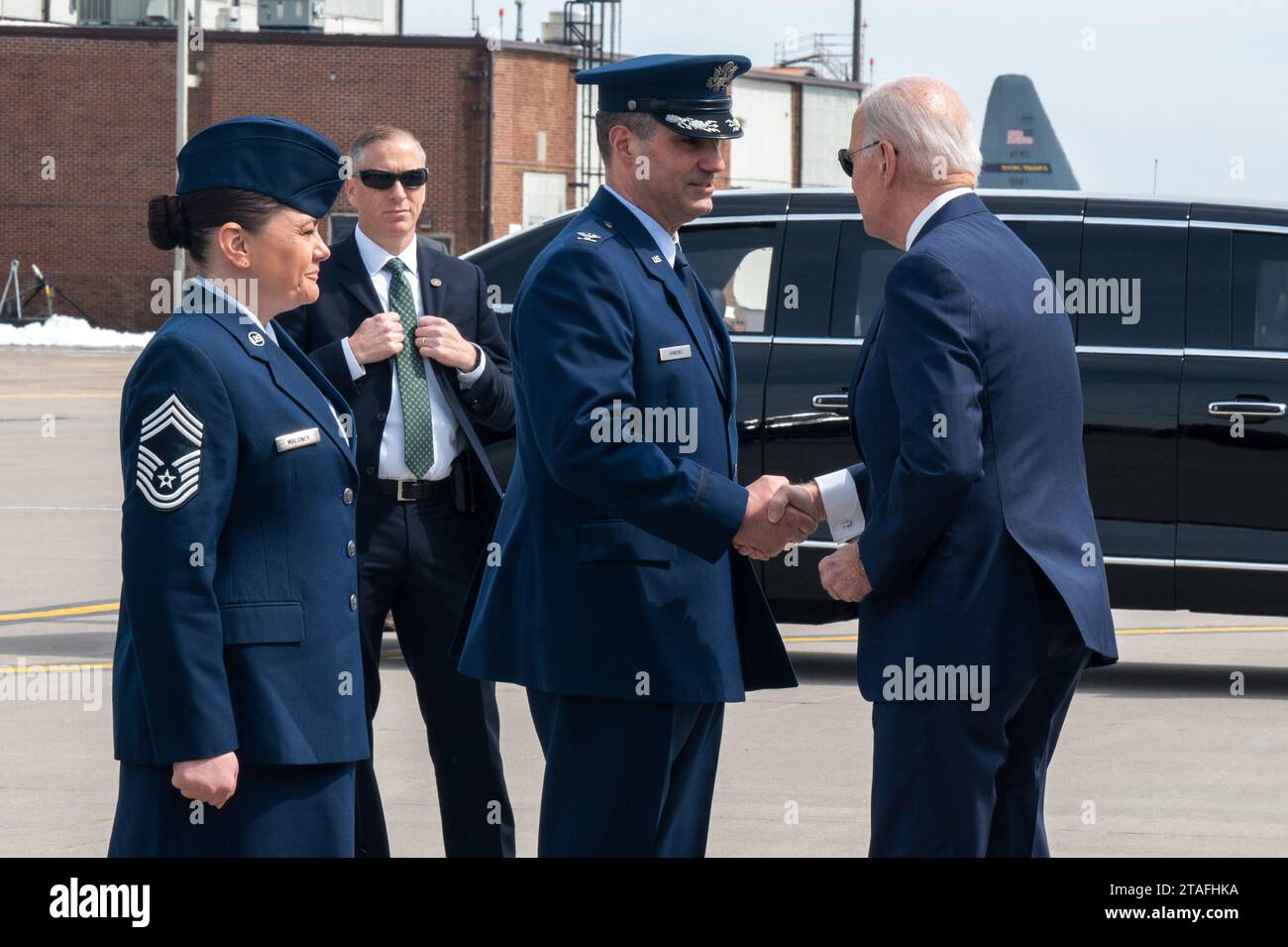 Col. Ethan Hinkins, the 934th Airlift Wing commander, middle, and Chief ...