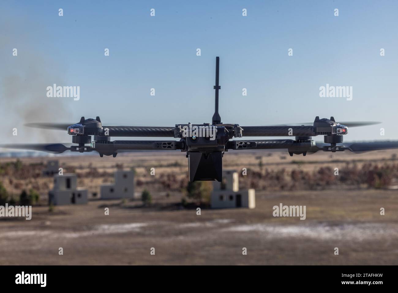 A U.S. Marine Corps SkyDio unmanned aircraft system flies during the ...