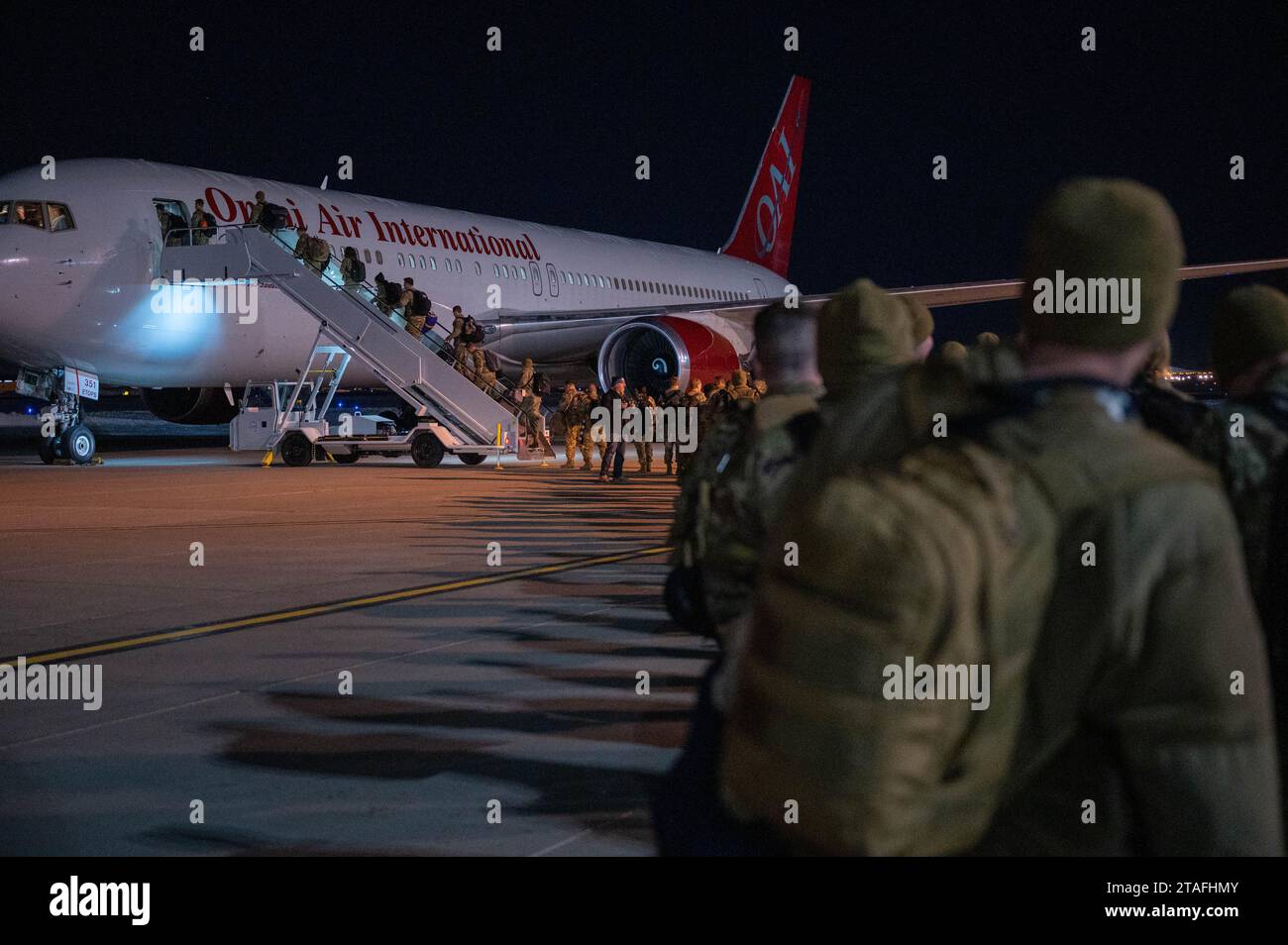 Deploying 934th Airlift Wing members line up for their departing ...