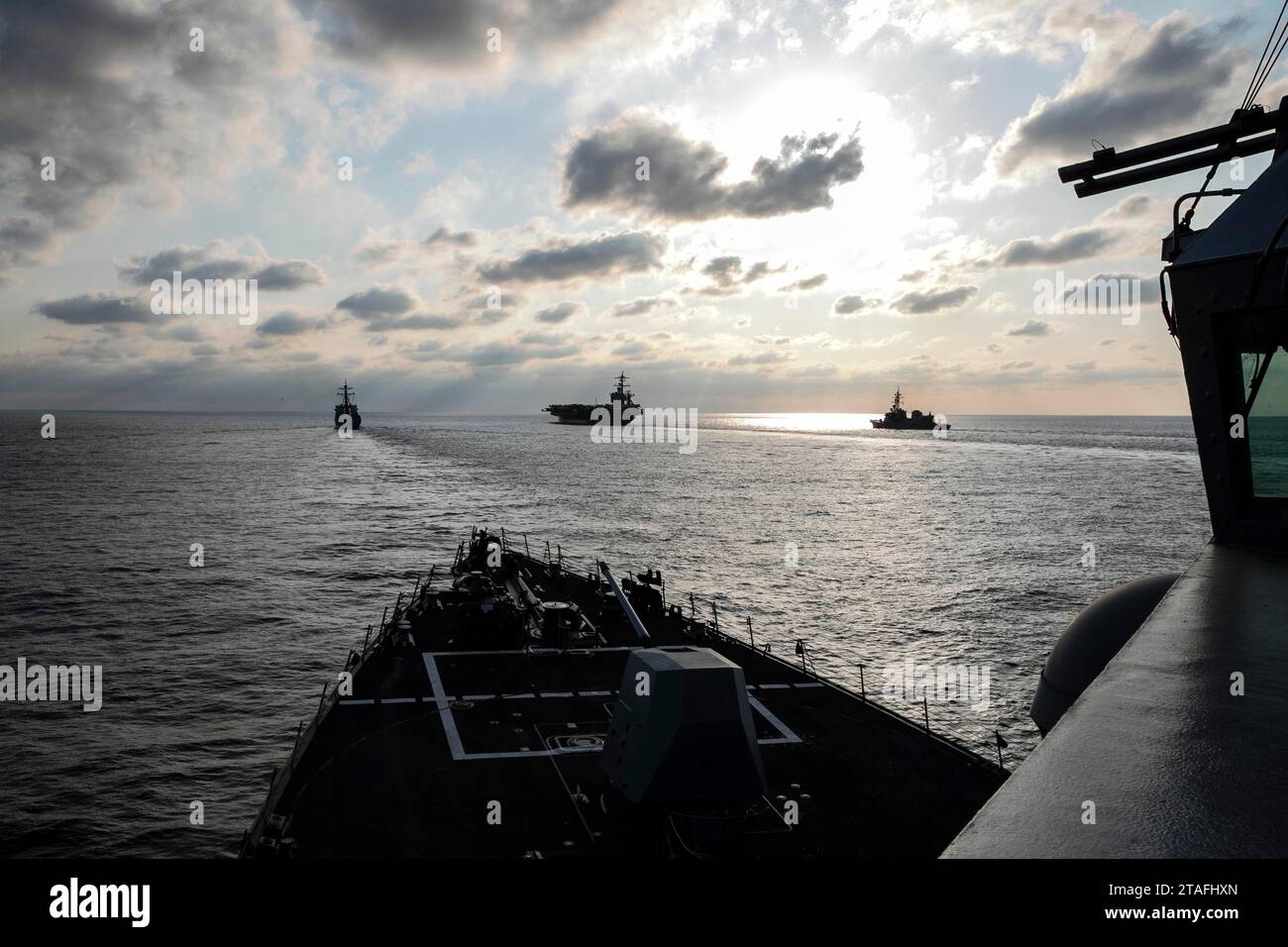 231126-N-VM650-1137 AT SEA (Nov. 26, 2023) (From left to right) The ...