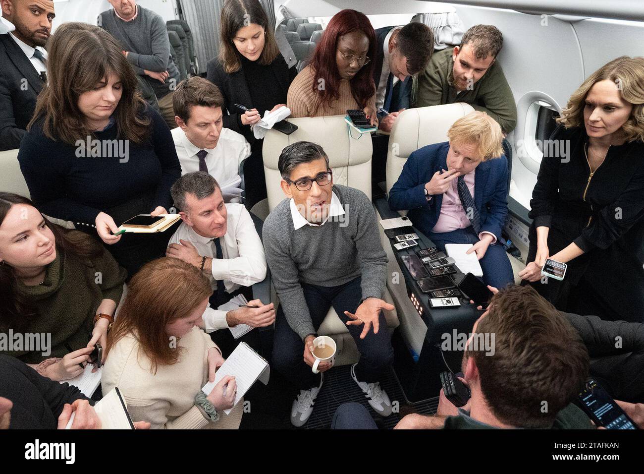 Prime Minister Rishi Sunak holds a "huddle" press conference with ...
