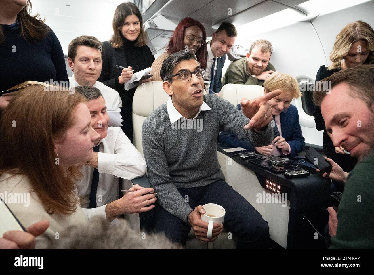 Prime Minister Rishi Sunak holds a "huddle" press conference with ...