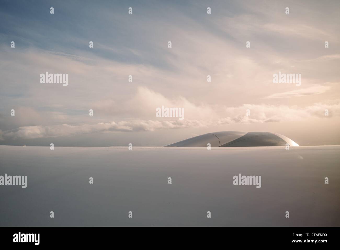 Beautiful clear deep blue sky over thick layer of clouds at ...