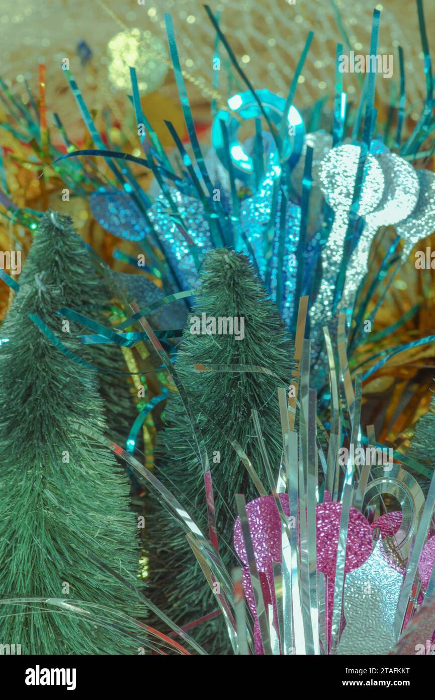 New Years holiday party decor is made with Christmas trees and paper ...
