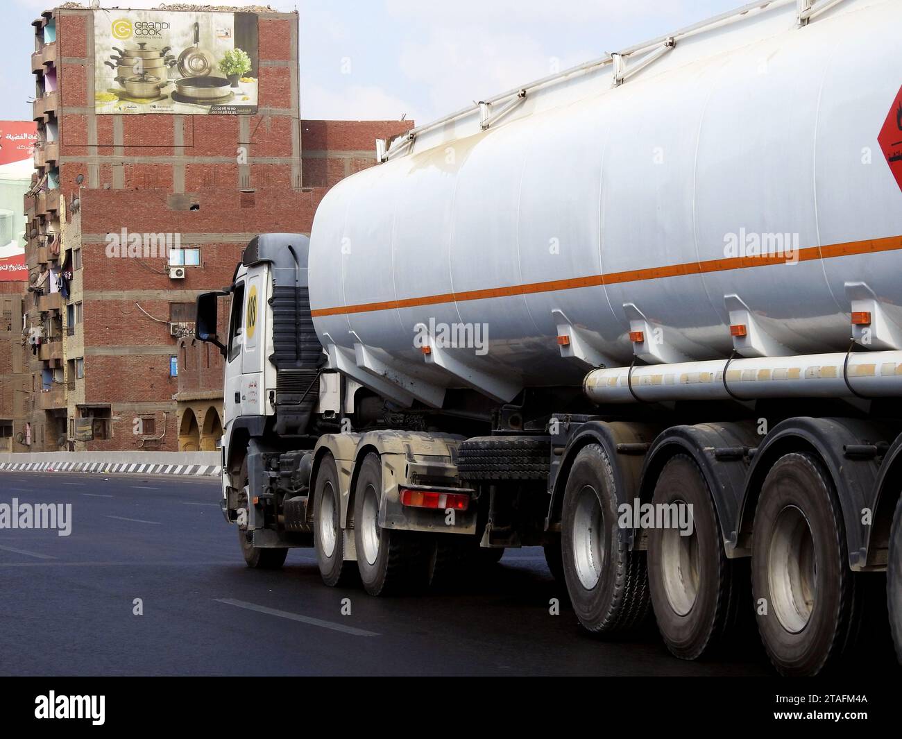Giza, Egypt, September 9 2022: Tanker truck with a container tank with ...