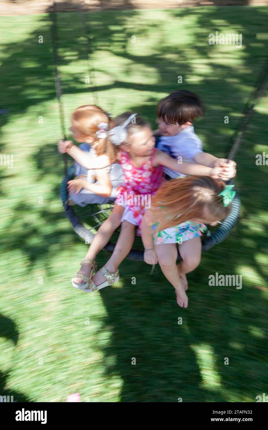 Group kids playing laughing hi-res stock photography and images - Alamy