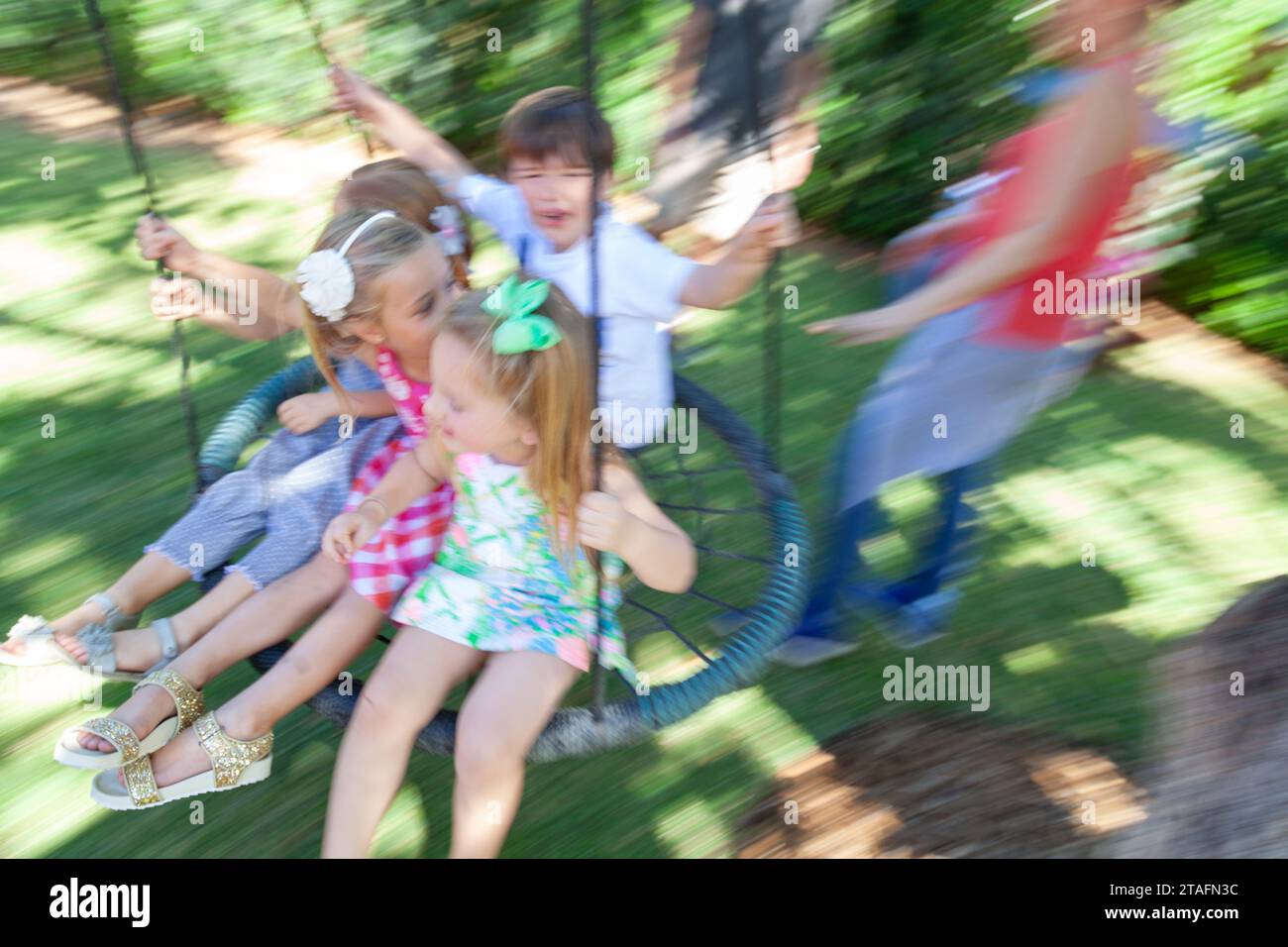 Girls on a rope swing hi-res stock photography and images - Alamy