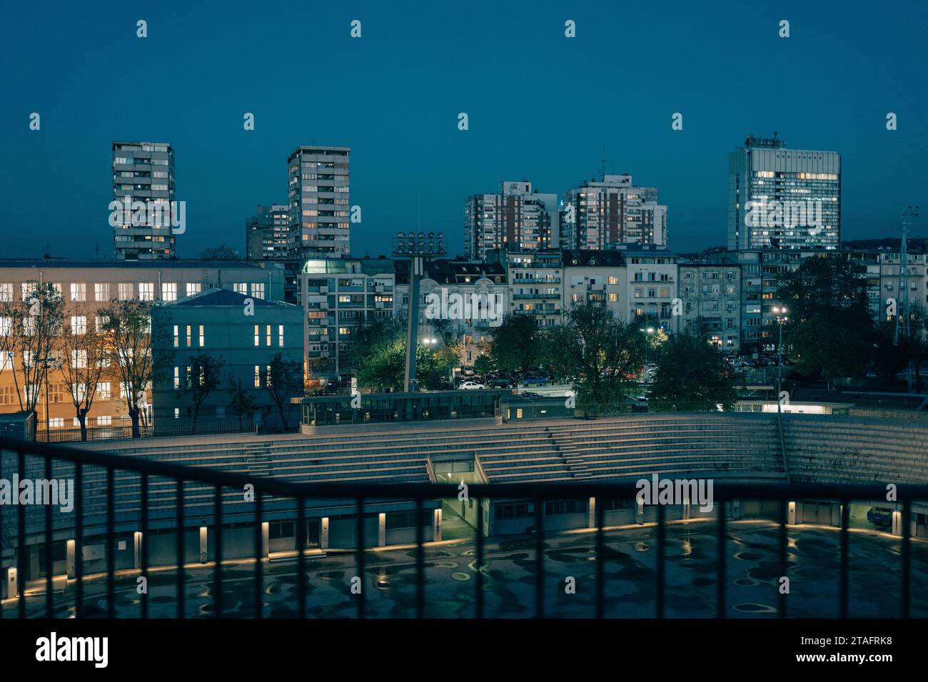 Blue hour view of distant buildings from Tasmajdan Park, Belgrade ...